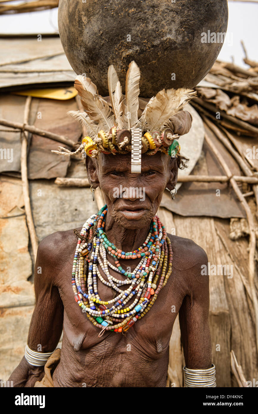 old Dassanech woman in front of her hut in the Lower Omo Valley of ...