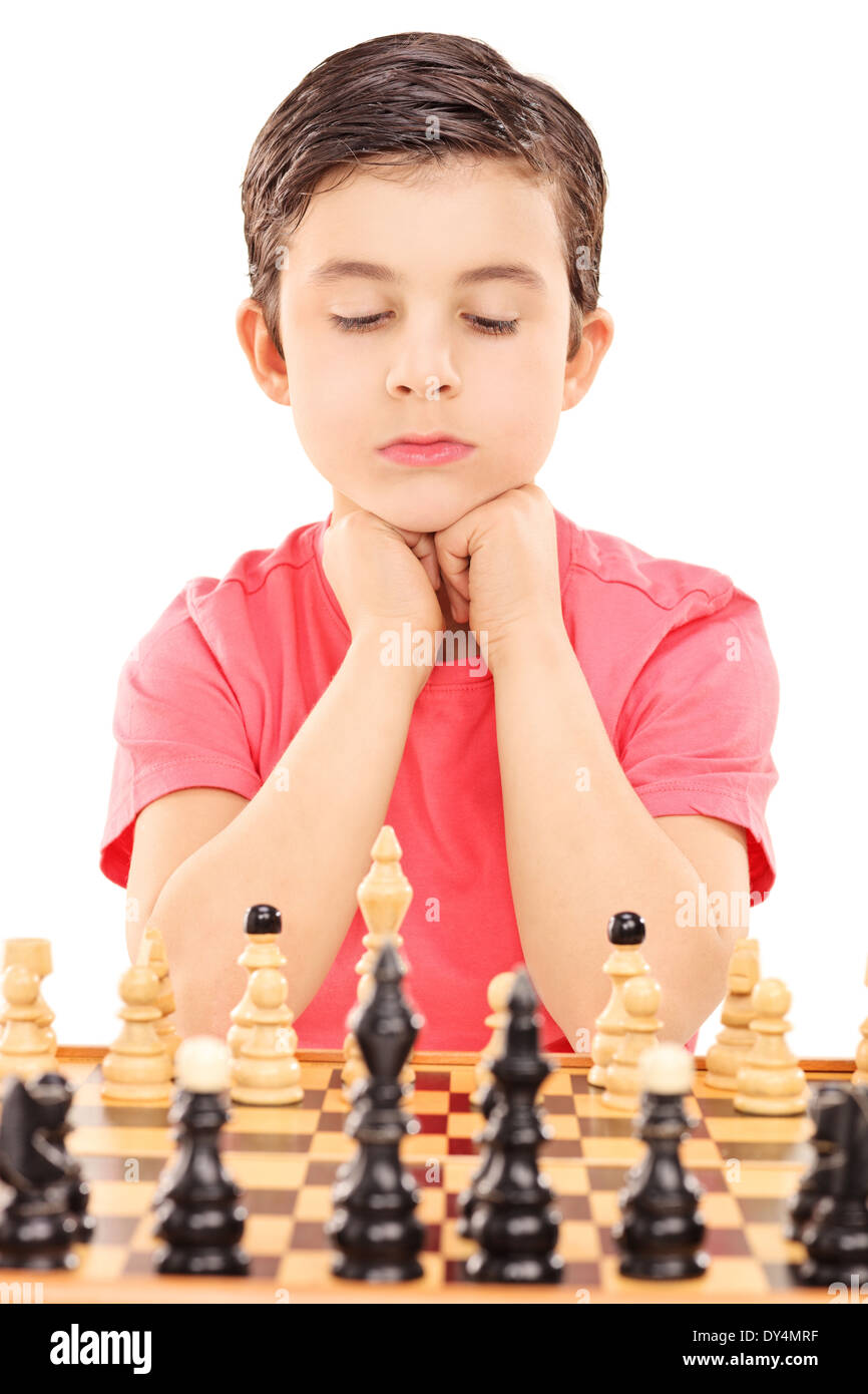 Boy playing chess Stock Photo - Alamy