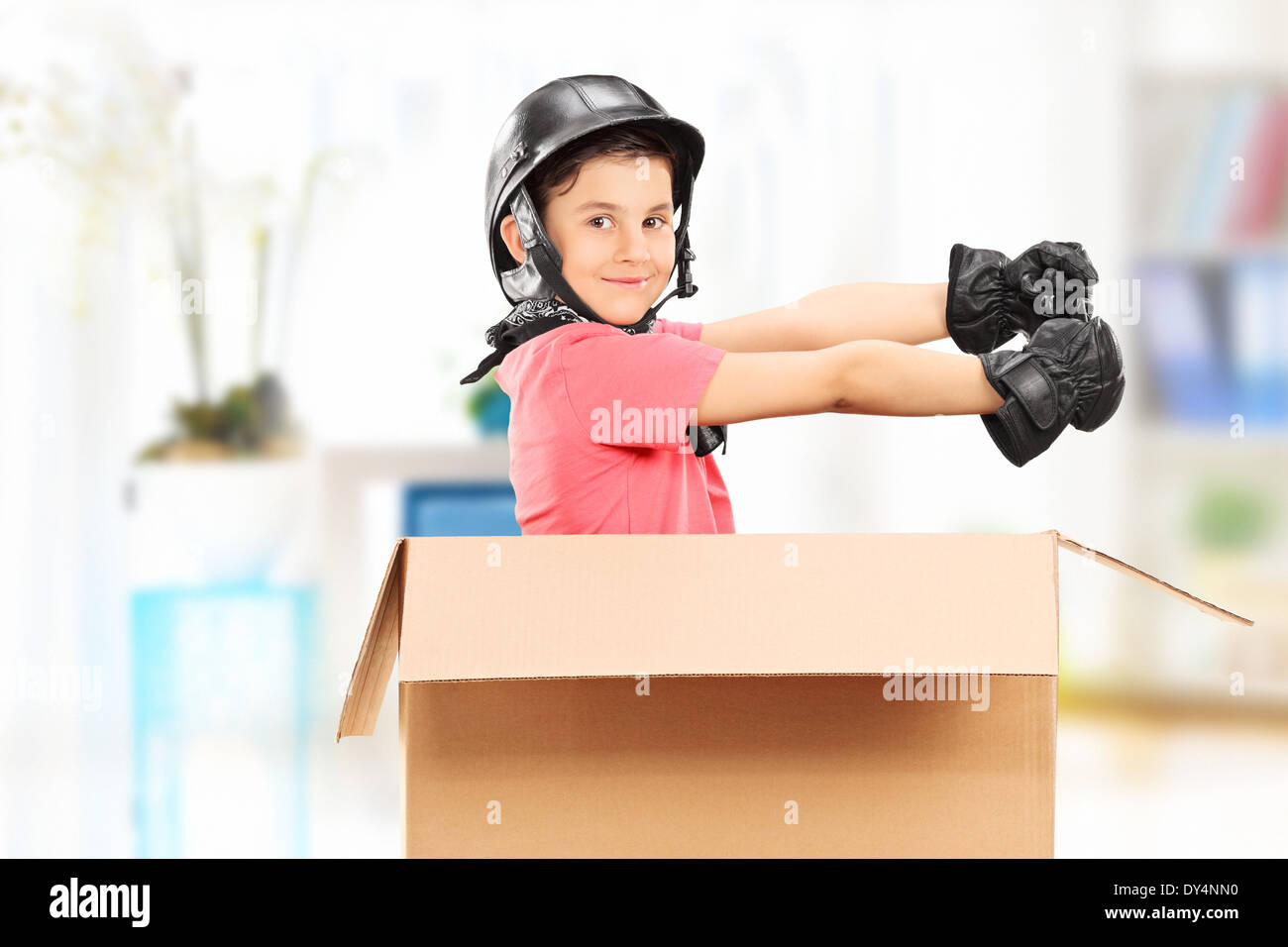 Boy in a box hi-res stock photography and images - Alamy