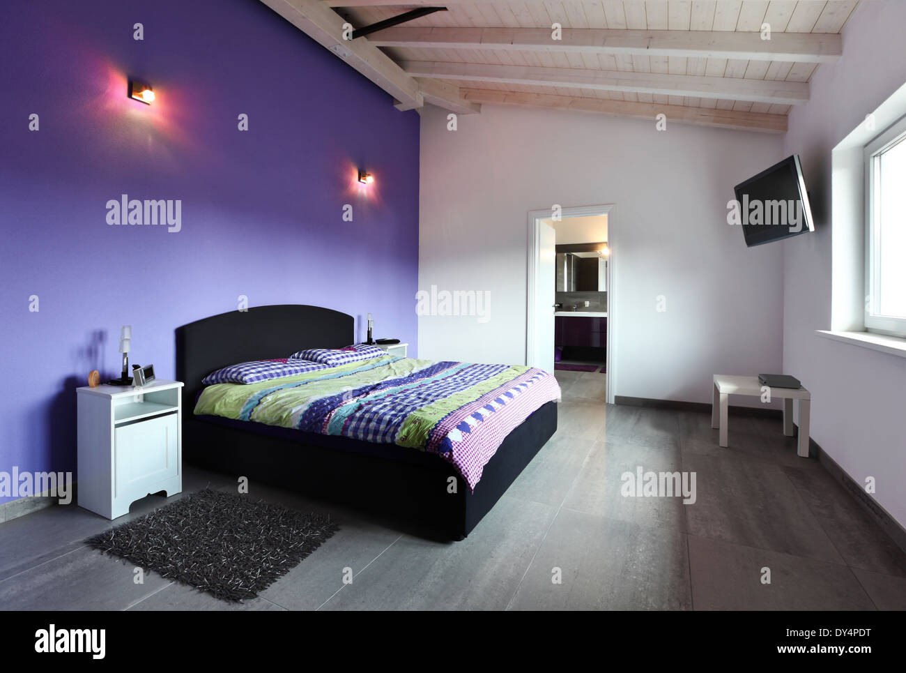 Interior design: purple modern Bedroom Stock Photo - Alamy