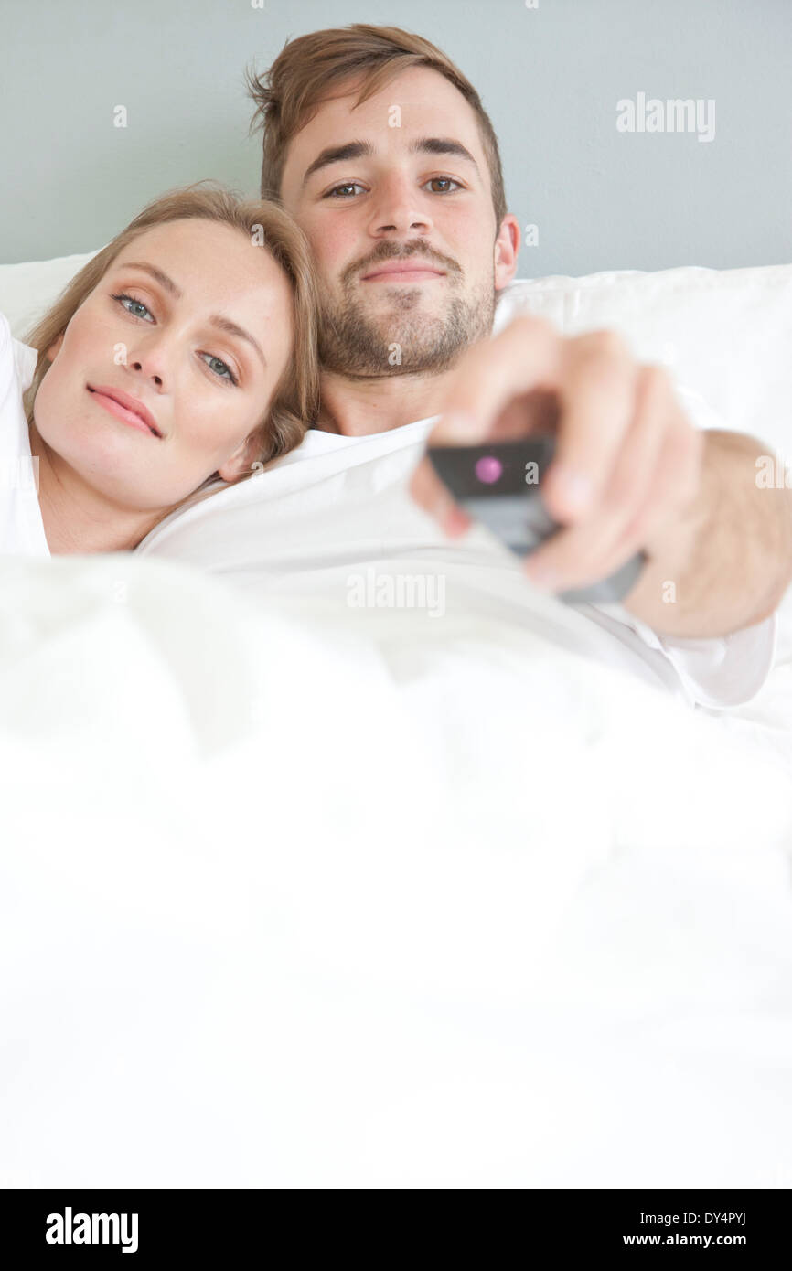 Young couple making love bed hi-res stock photography and images - Alamy