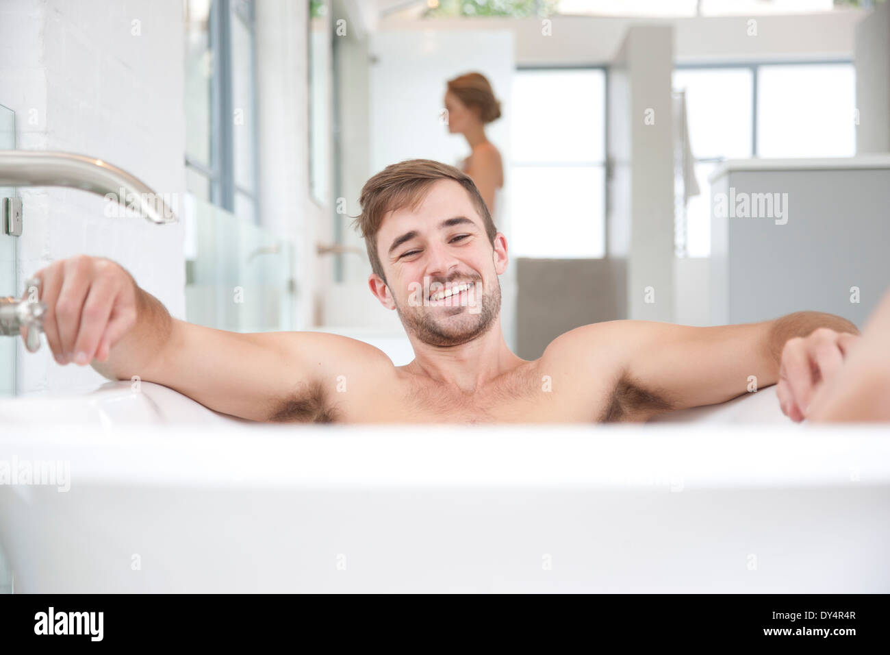 Man in a bathtub hi-res stock photography and images - Alamy