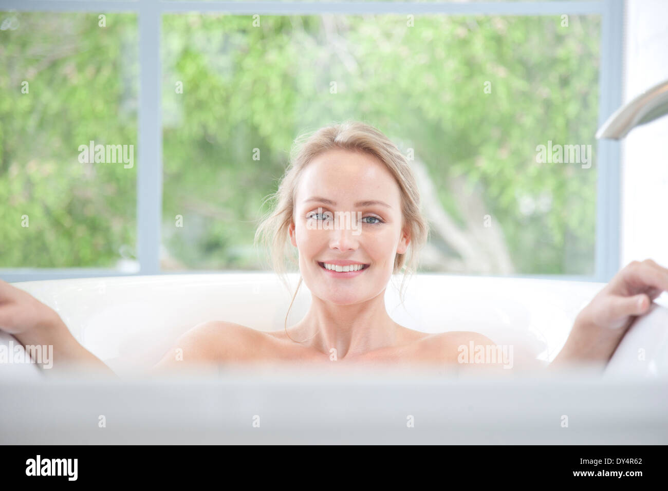 Woman soaking in bath hi-res stock photography and images - Alamy
