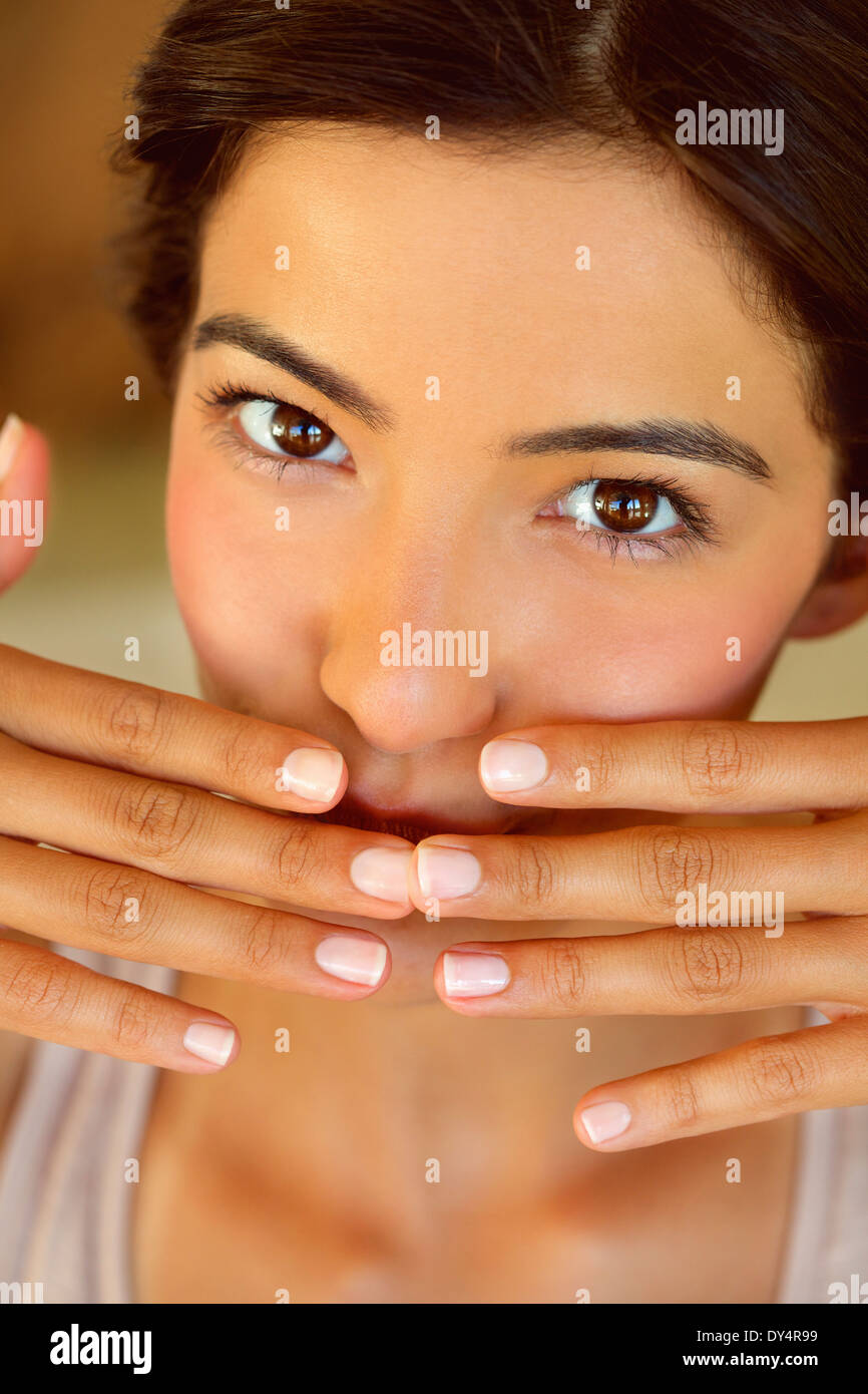 Hands covering mouth hi-res stock photography and images - Alamy