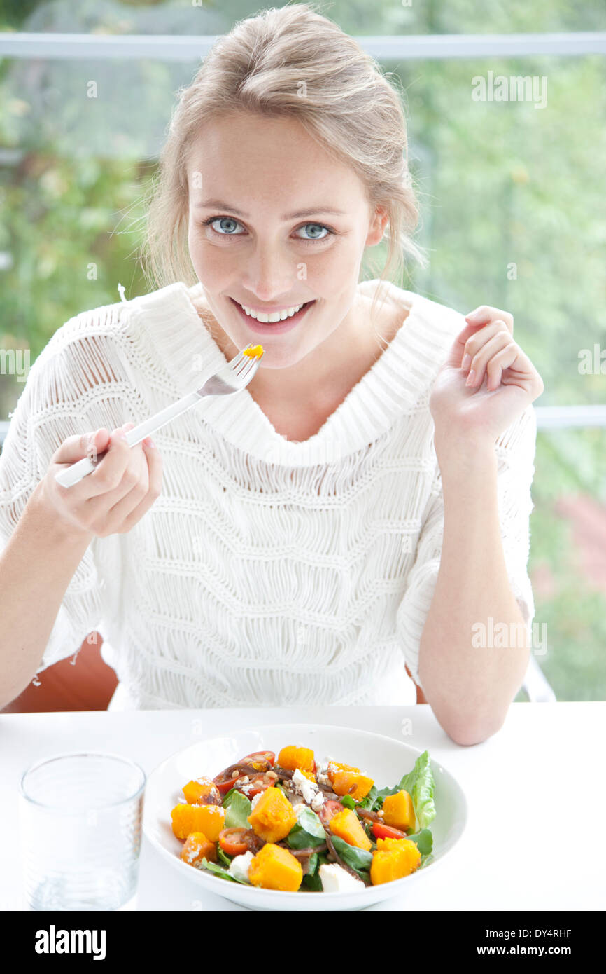 Woman eating vegetables hi-res stock photography and images - Alamy