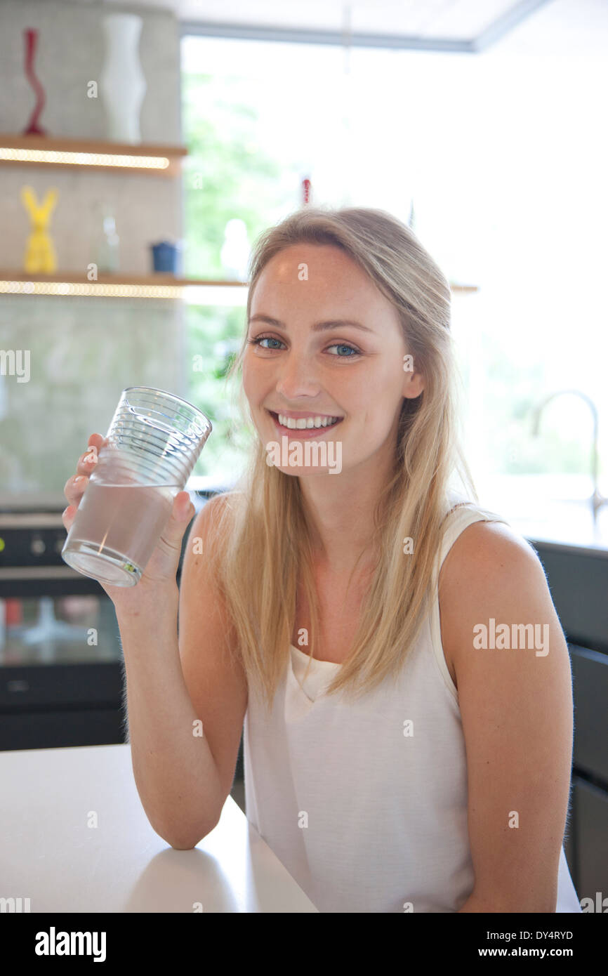 Woman drinking water hi-res stock photography and images - Alamy