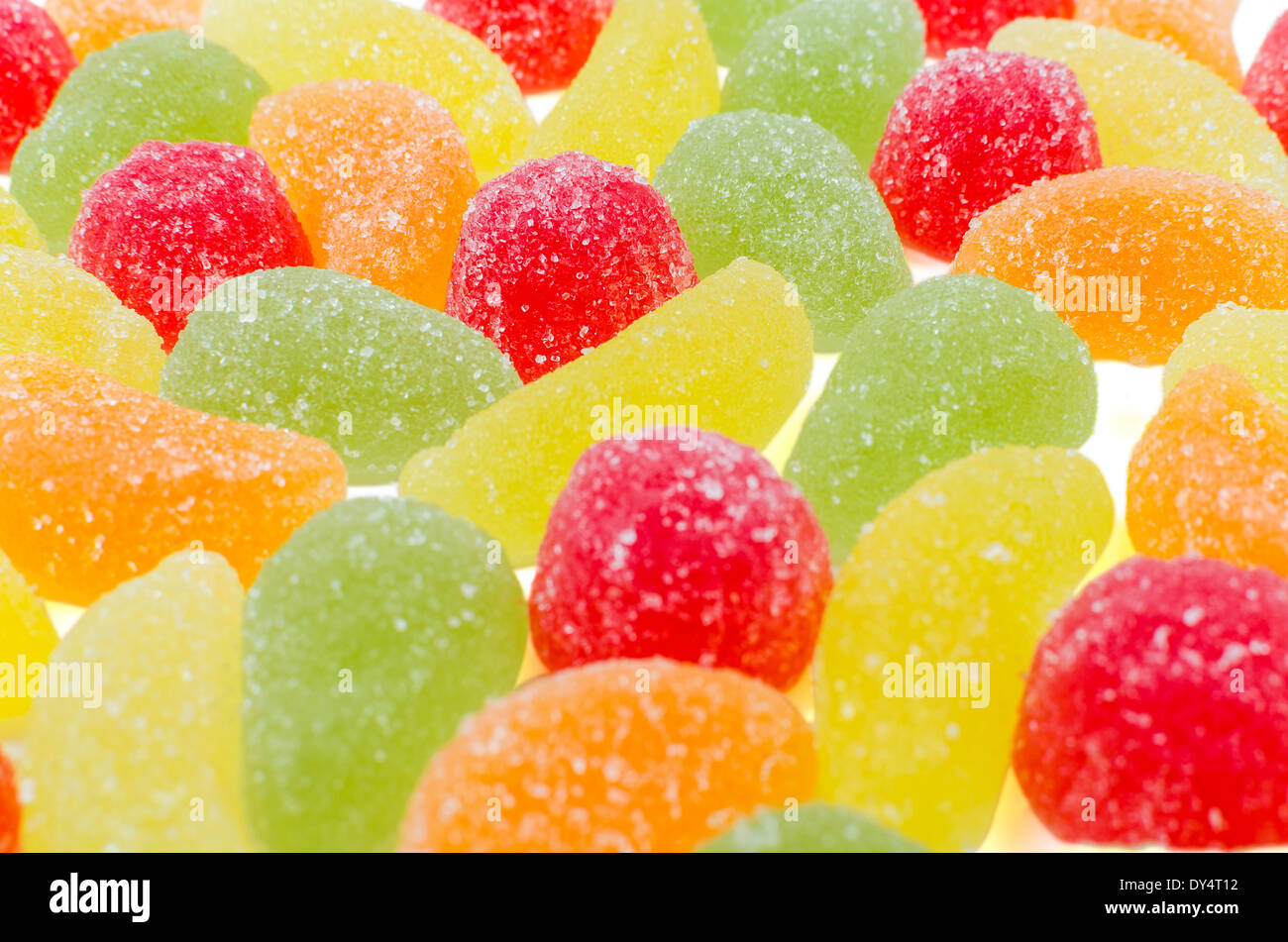 Pieces of marmalade isolated over white background Stock Photo - Alamy