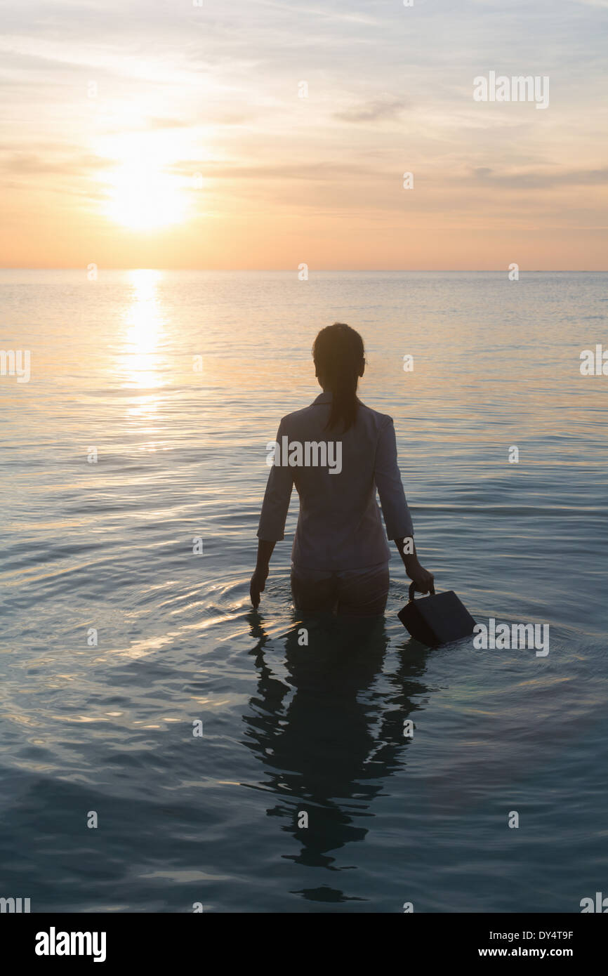 Person standing in the sea hi-res stock photography and images - Alamy