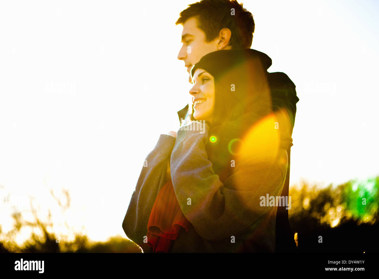 Romantic couple in sunlight Stock Photo - Alamy