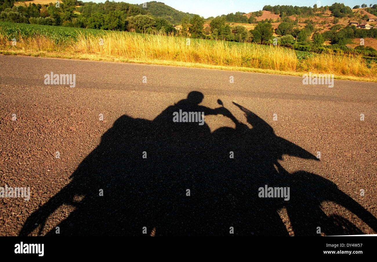 Shadow of Adventurer Motorcycle and rider Stock Photo - Alamy