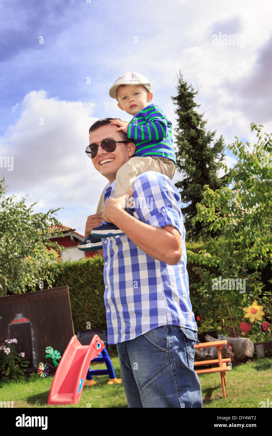 Father son working in yard hi-res stock photography and images - Alamy