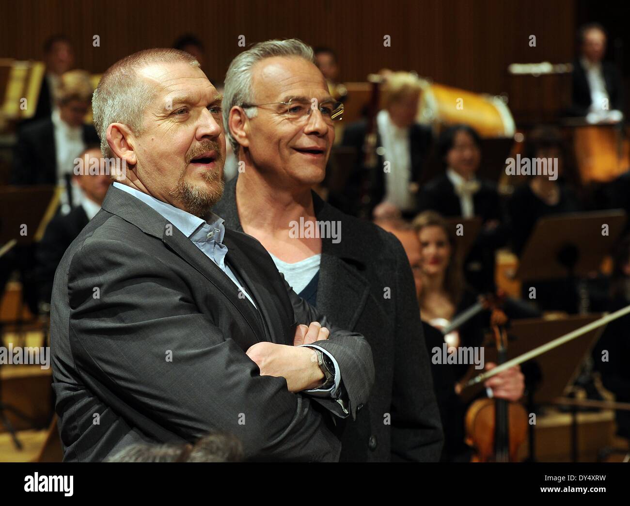 Cologne, Germany. 07th Apr, 2014. German actors Dietmar Baer (L) and ...
