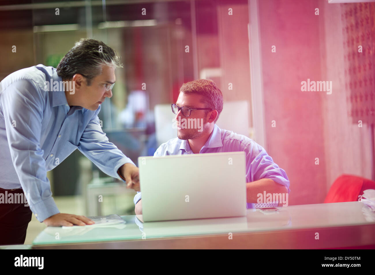 Sitting face to face communication authority hi-res stock photography ...