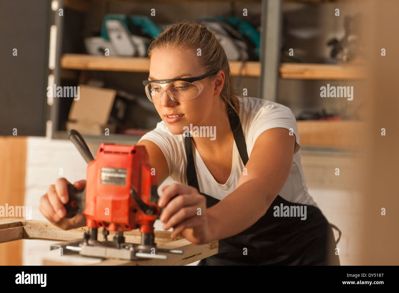 Working with tools hi-res stock photography and images - Alamy