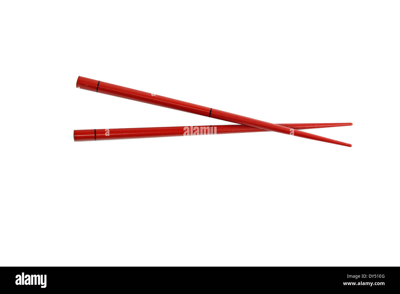 Red chopsticks isolated on white background Stock Photo - Alamy