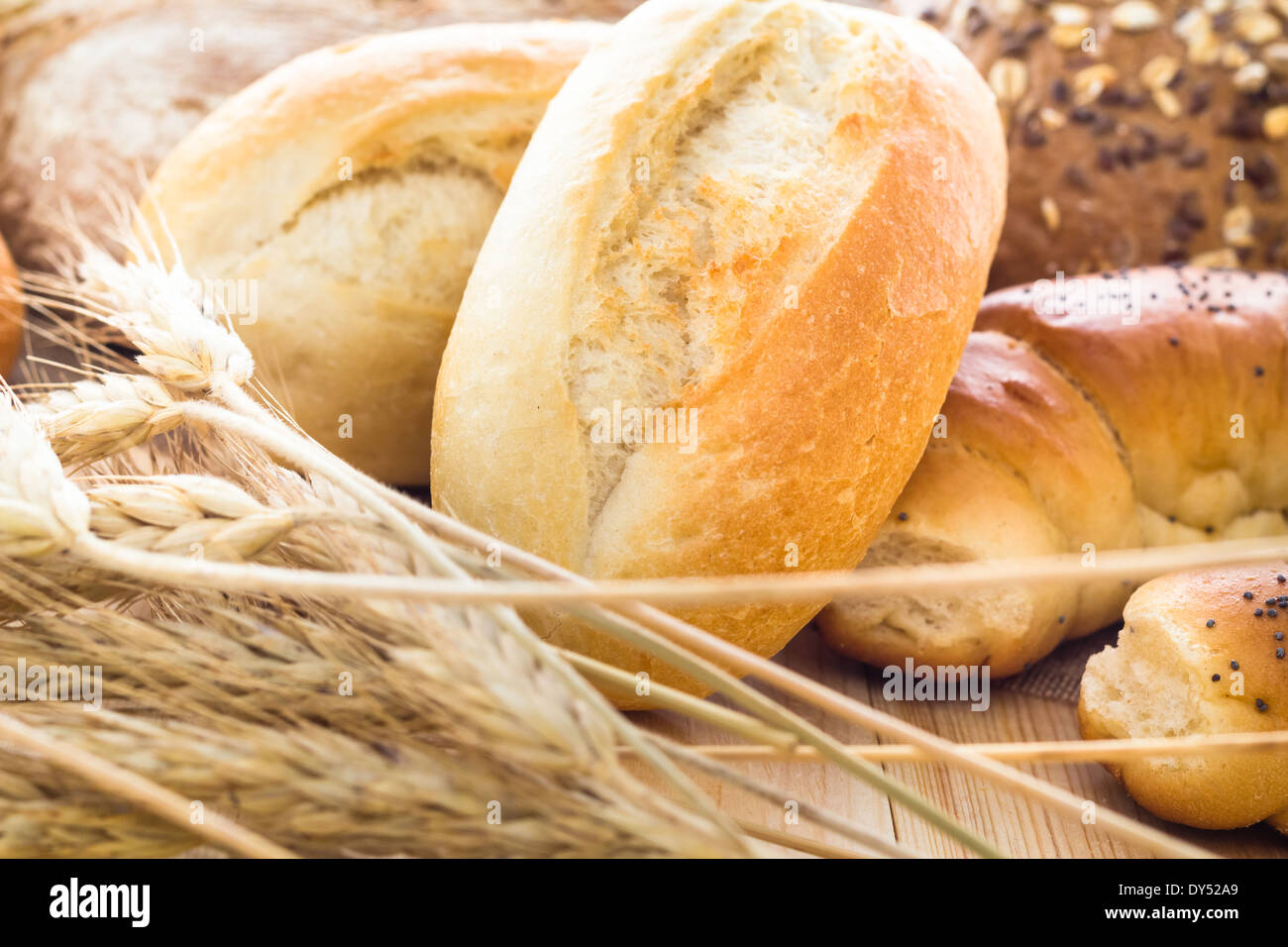 Different bakery products including bread rolls with grain Stock Photo ...