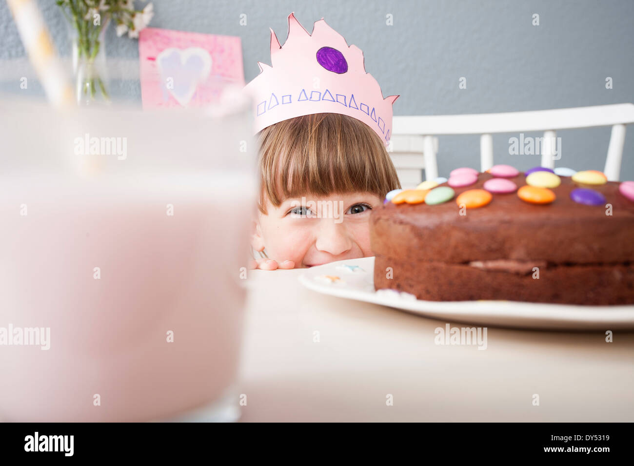 Girl hiding behind cake hi-res stock photography and images - Alamy