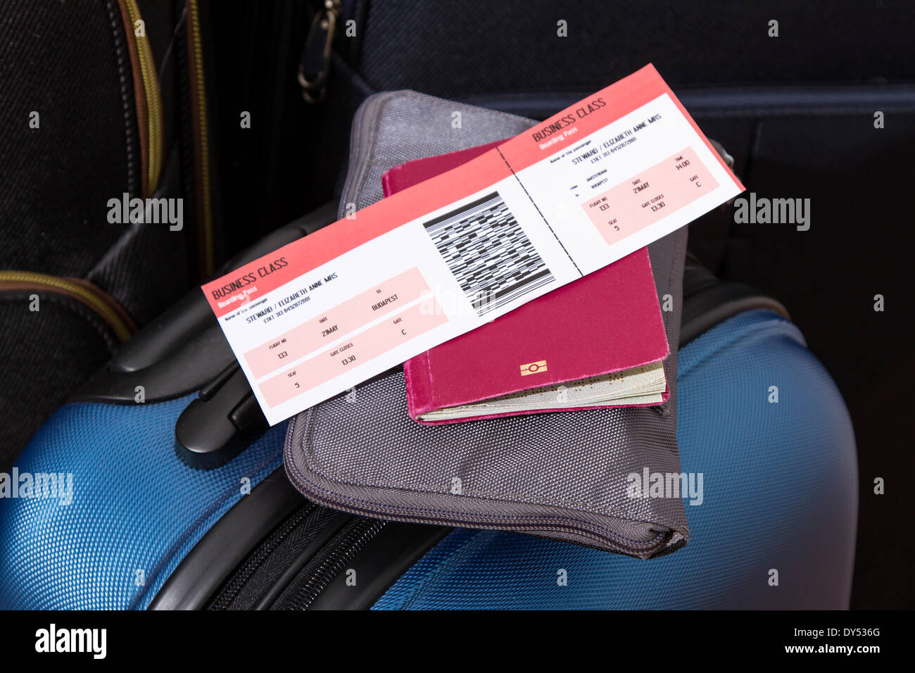 Airline ticket, passport and luggage, ready to travel Stock Photo - Alamy