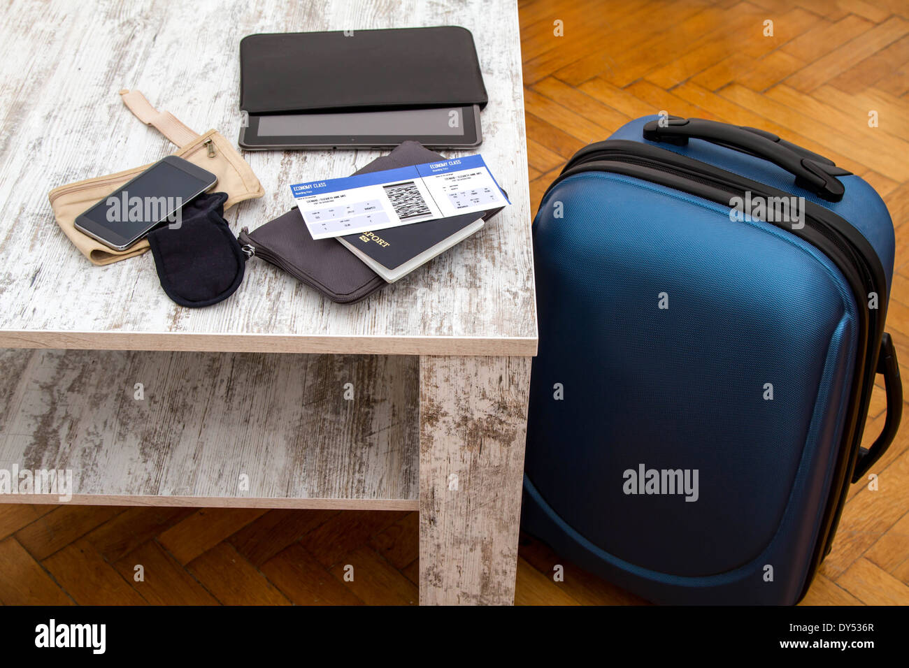 Airline ticket, passport and luggage, ready to travel Stock Photo - Alamy
