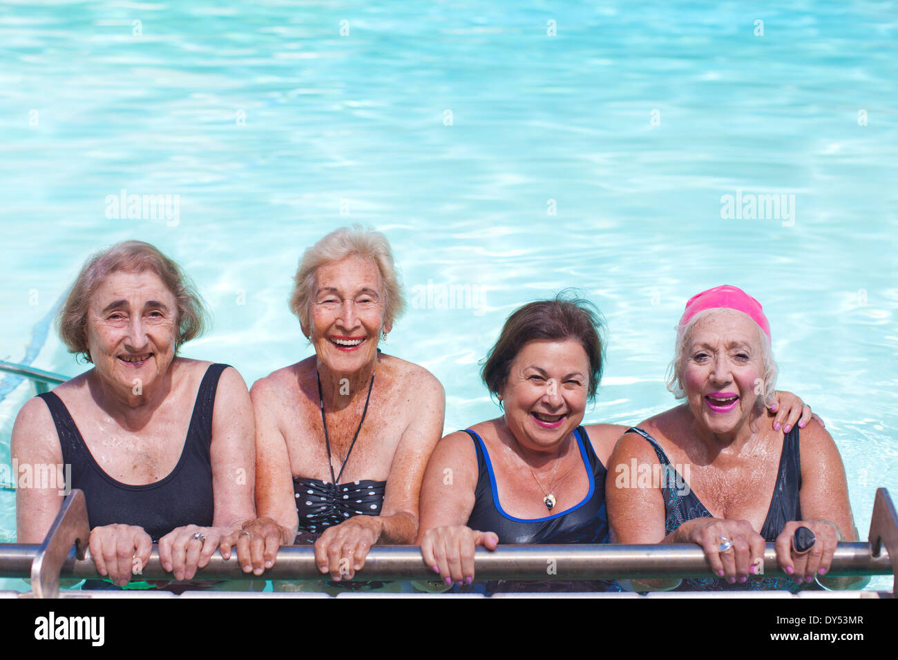 Portrait of four senior women in swimming pool Stock Photo - Alamy