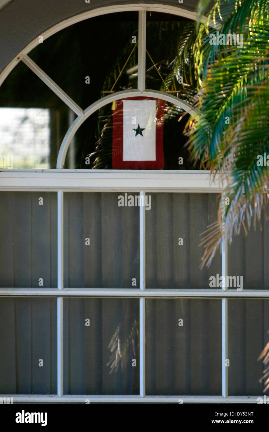 A single star in the window of a house denoting a family member is on ...
