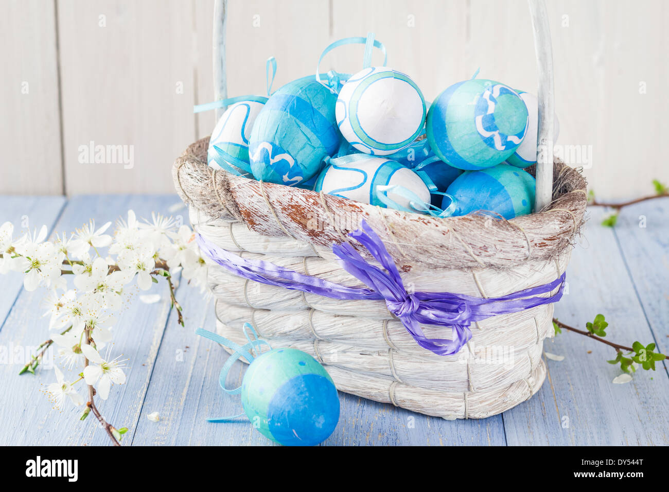 Spring basket with Easter eggs in a blue tone Stock Photo - Alamy