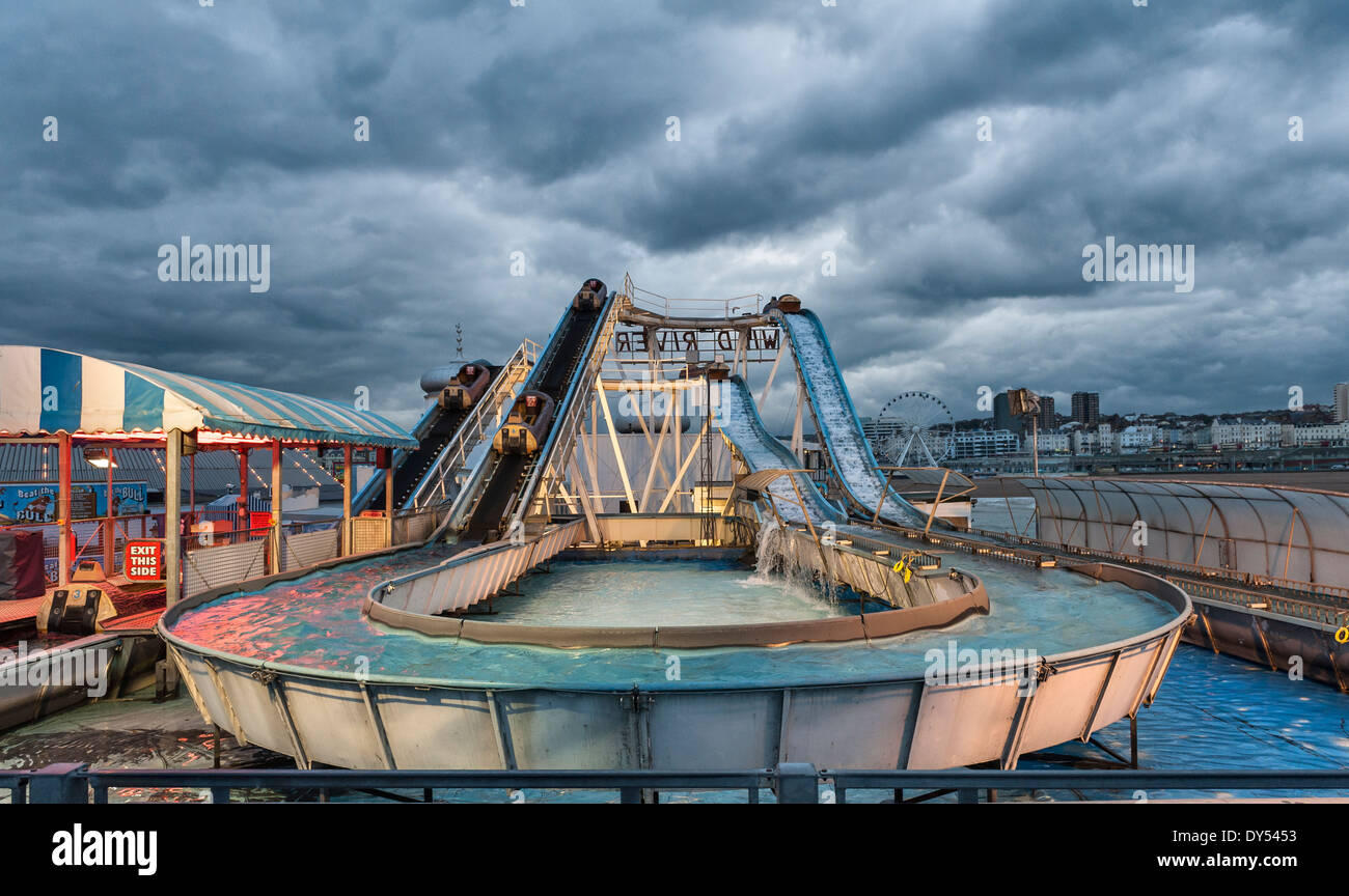 Funfair ride at night, on Brighton Pier, under a stormy sky (UK Stock ...