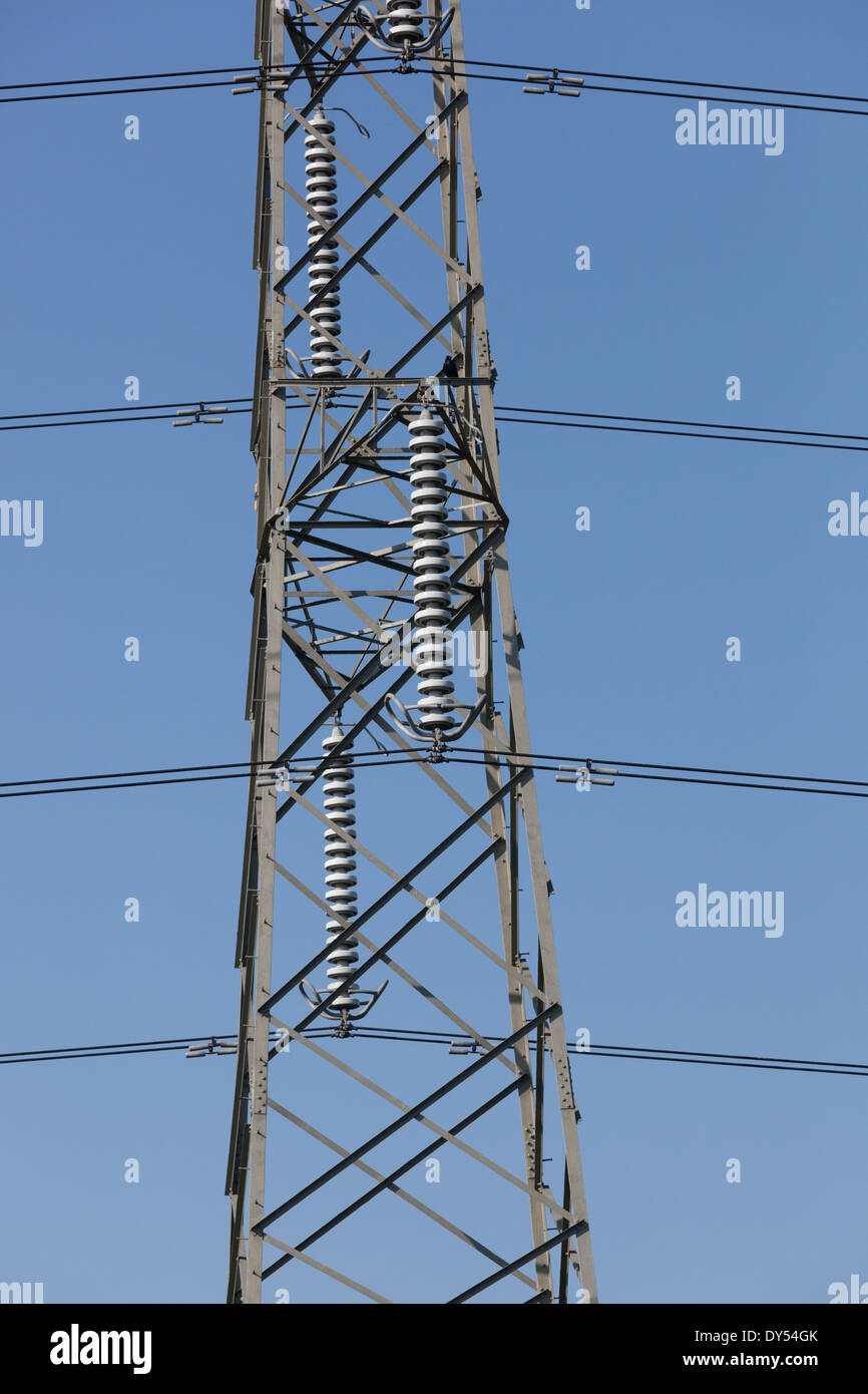 Insulators and high voltage cables on an electricity pylon Stock Photo ...
