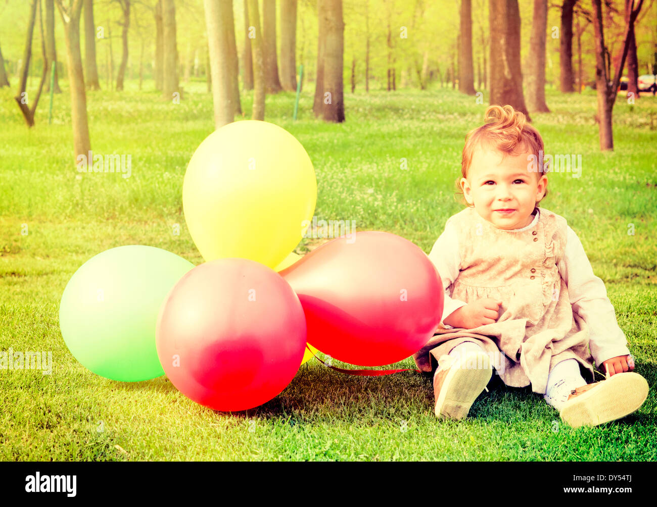 Child with balloons Stock Photo - Alamy