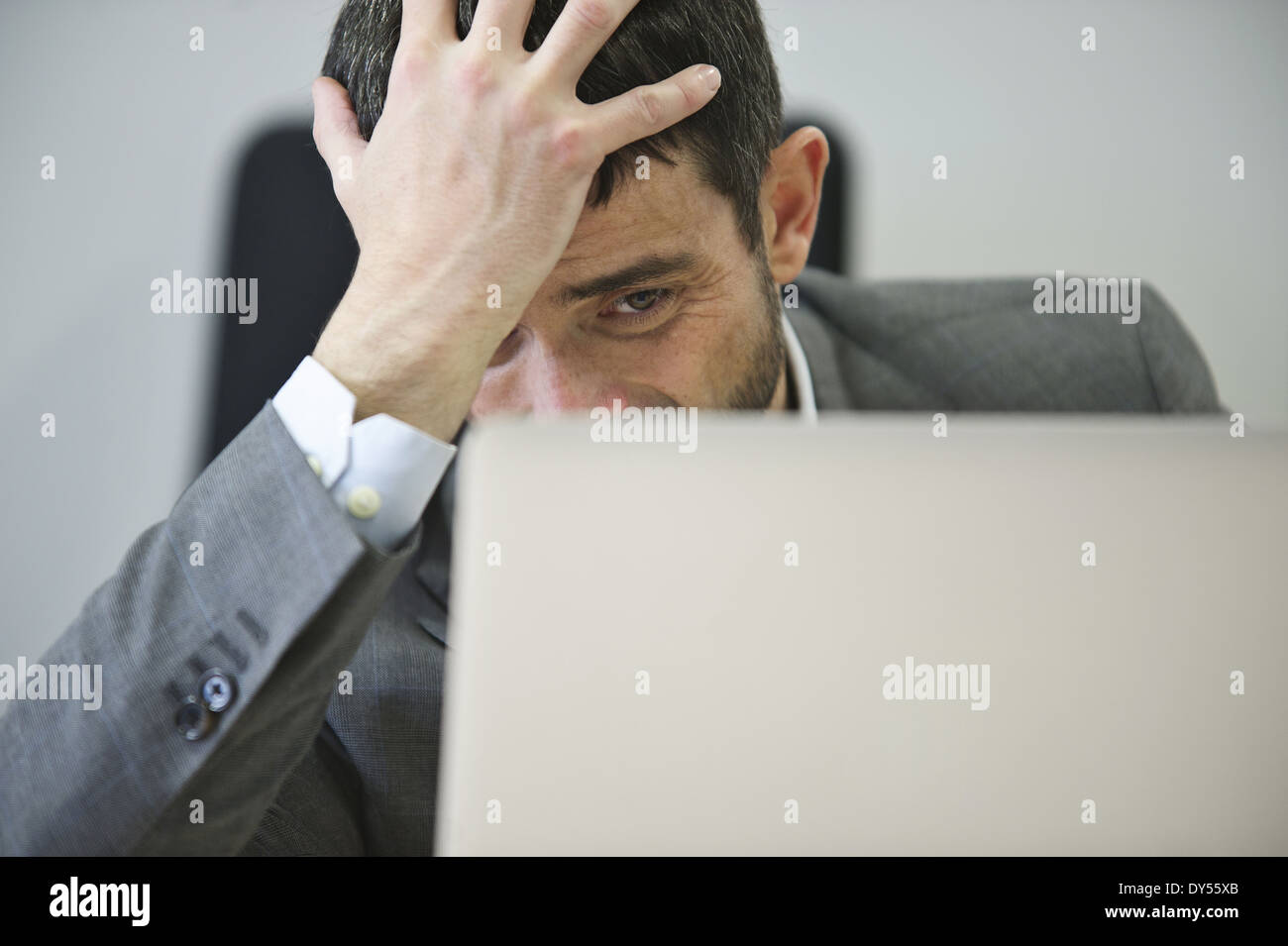 Young businessman looking stressed Stock Photo - Alamy Young businessman looking stressed Stock Photo - Alamy