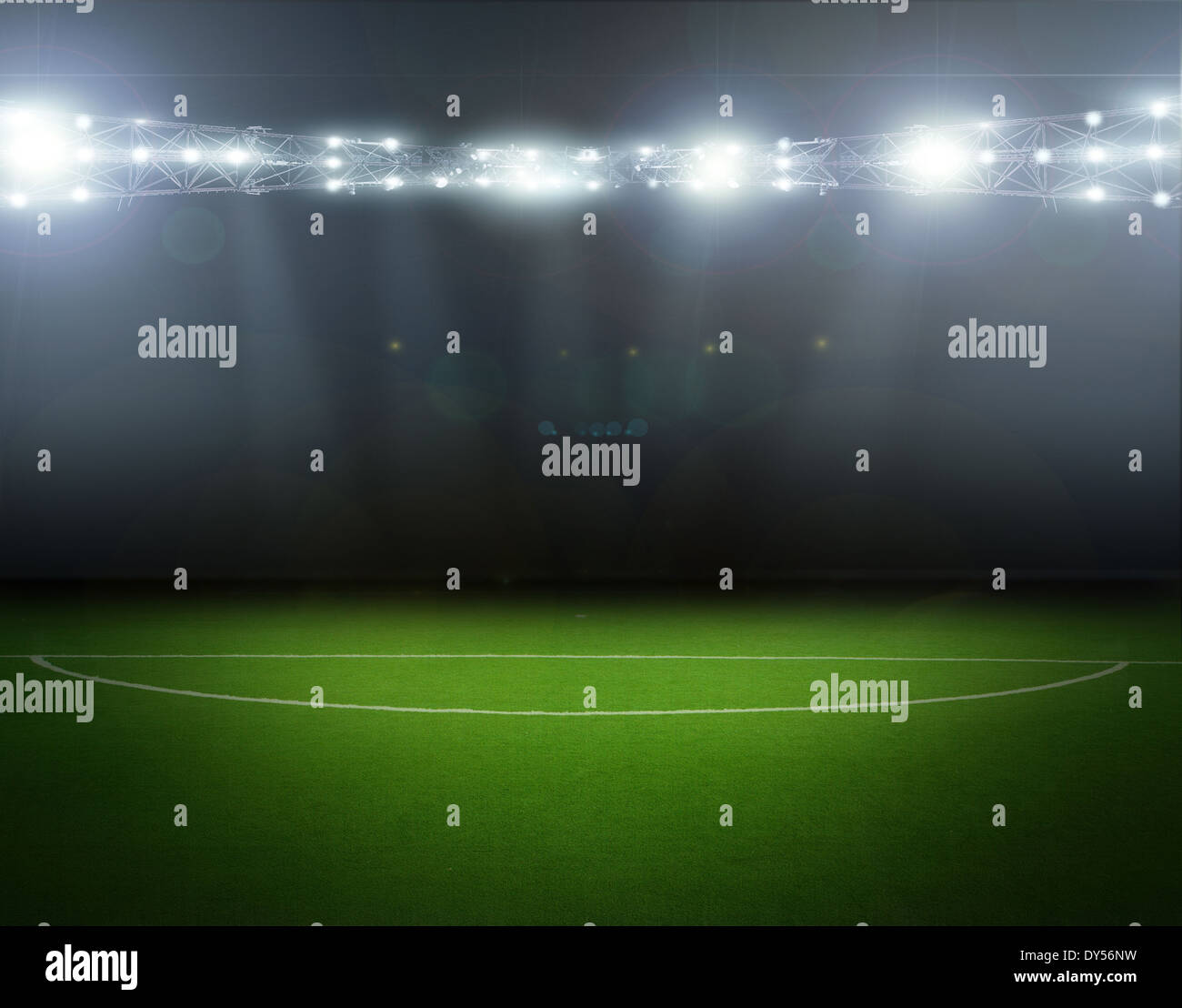 Green soccer field, bright spotlights, illuminated stadium Stock Photo ...