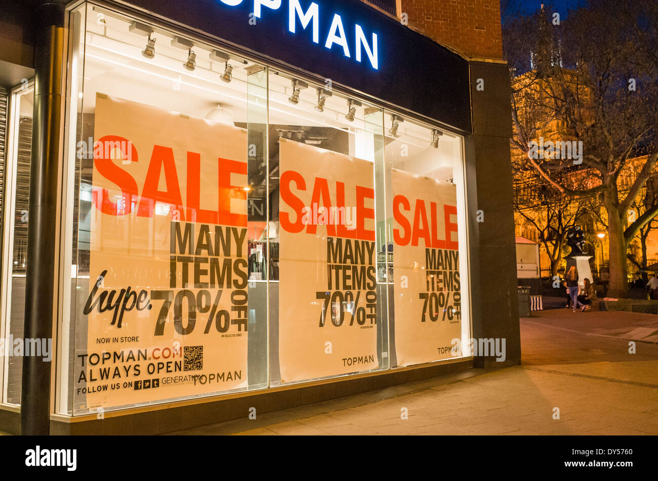 Sale Posters in Topman Retail Shop Window at Night Stock Photo - Alamy