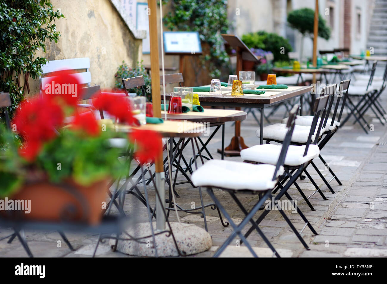 Outdoor cafe in Italian town Stock Photo - Alamy
