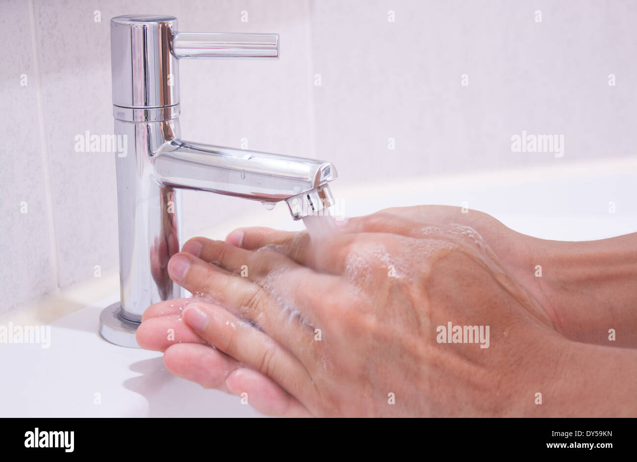 Rinsing hands hi-res stock photography and images - Alamy