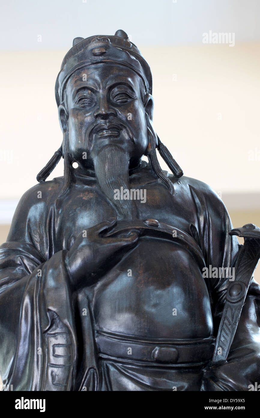 Black deity statues of Chinese religion in temple Stock Photo - Alamy