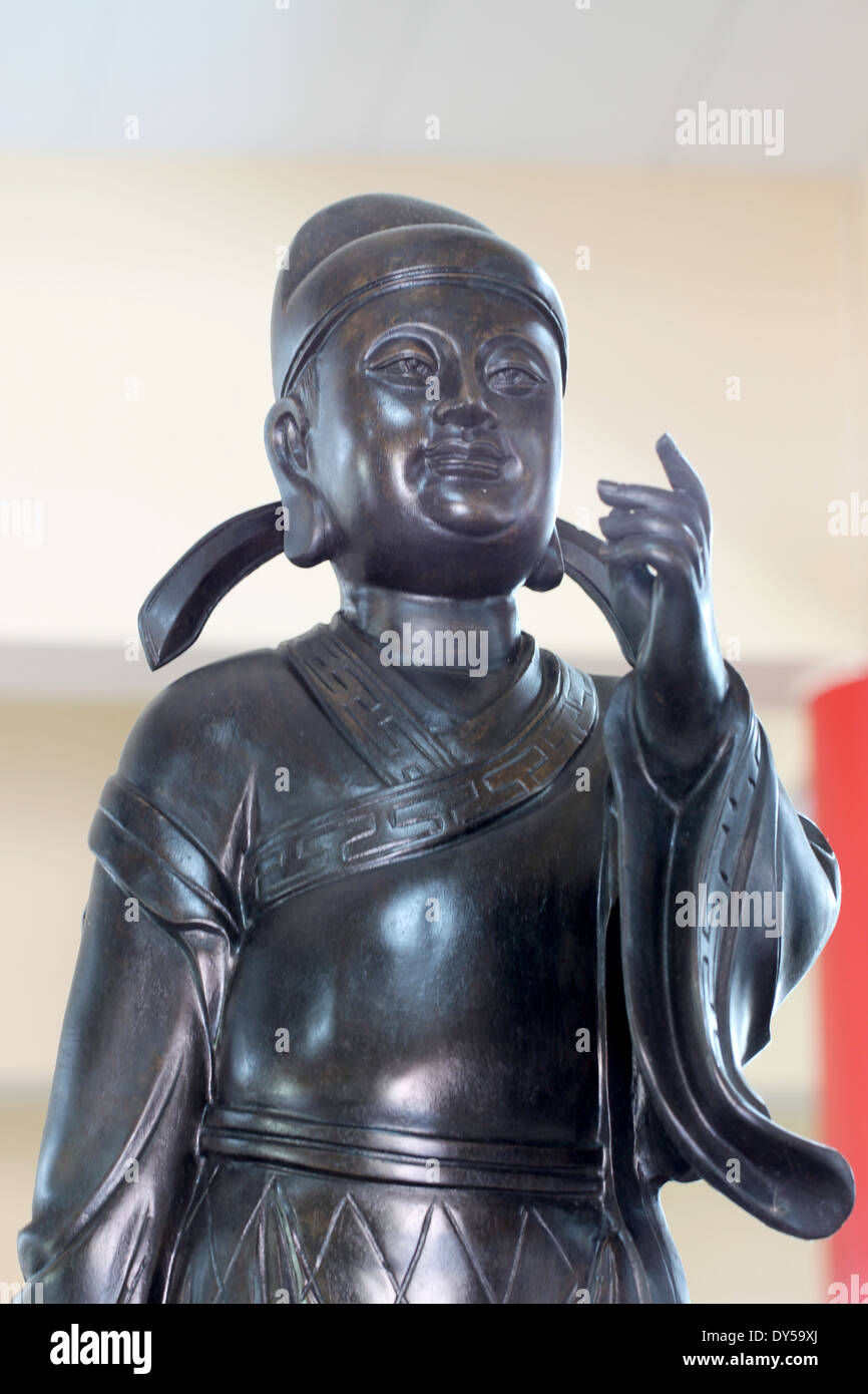 Black deity statues of Chinese religion in temple Stock Photo - Alamy