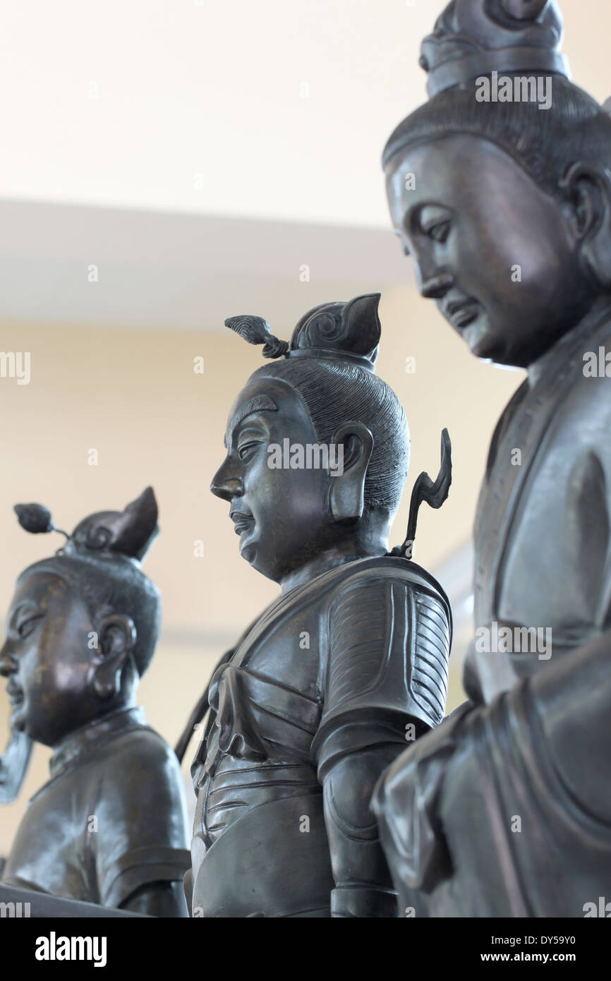 Black deity statues of Chinese religion in temple Stock Photo - Alamy