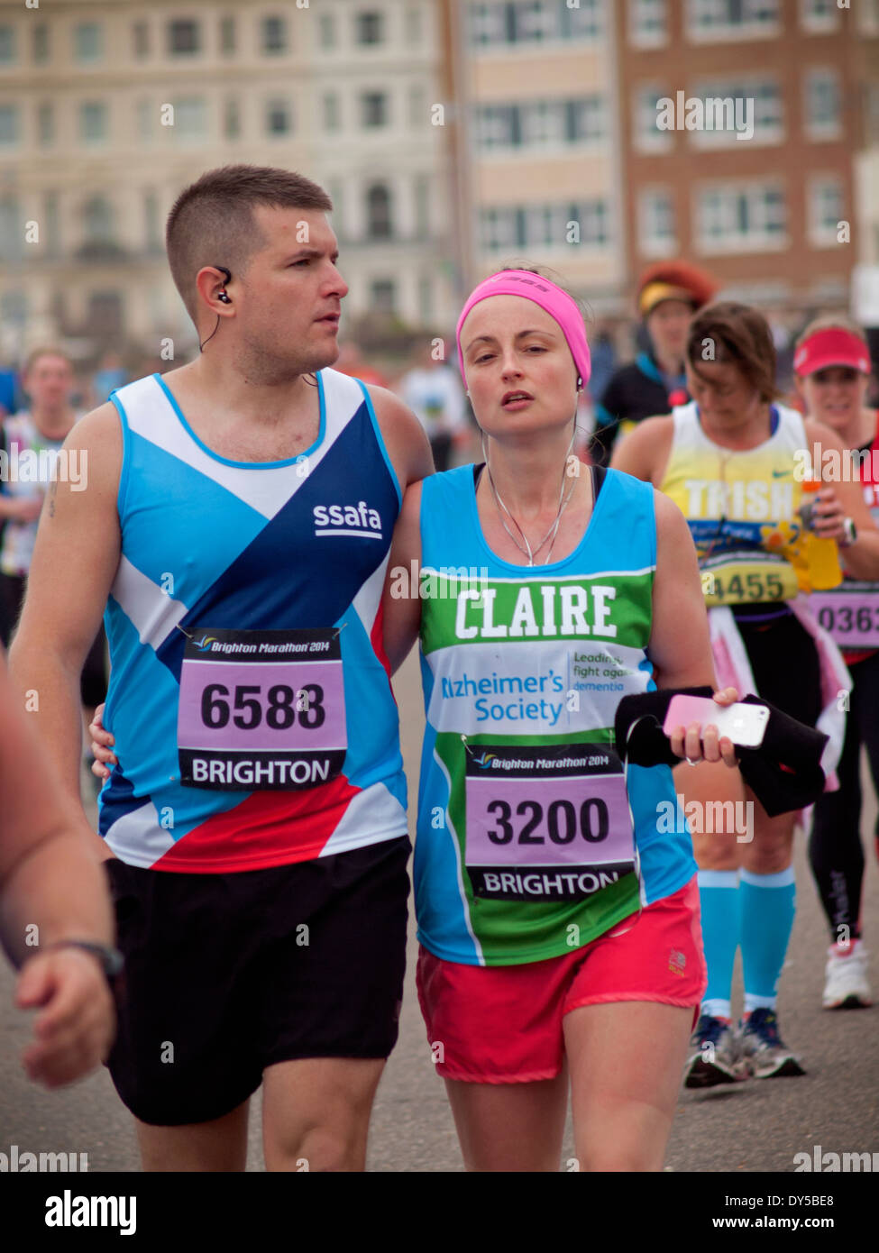 Amateur runners in the Brighton Marathon struggle towards the finishing ...