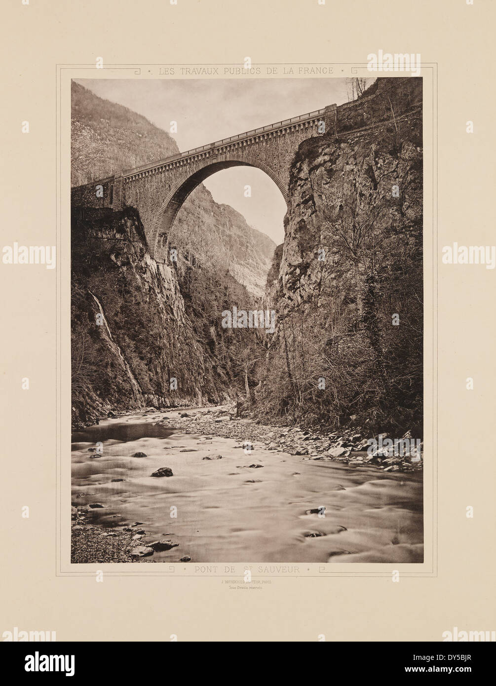 The Pont de St Sauveur, also known as Napoleon Bridge, spans the Luz ...