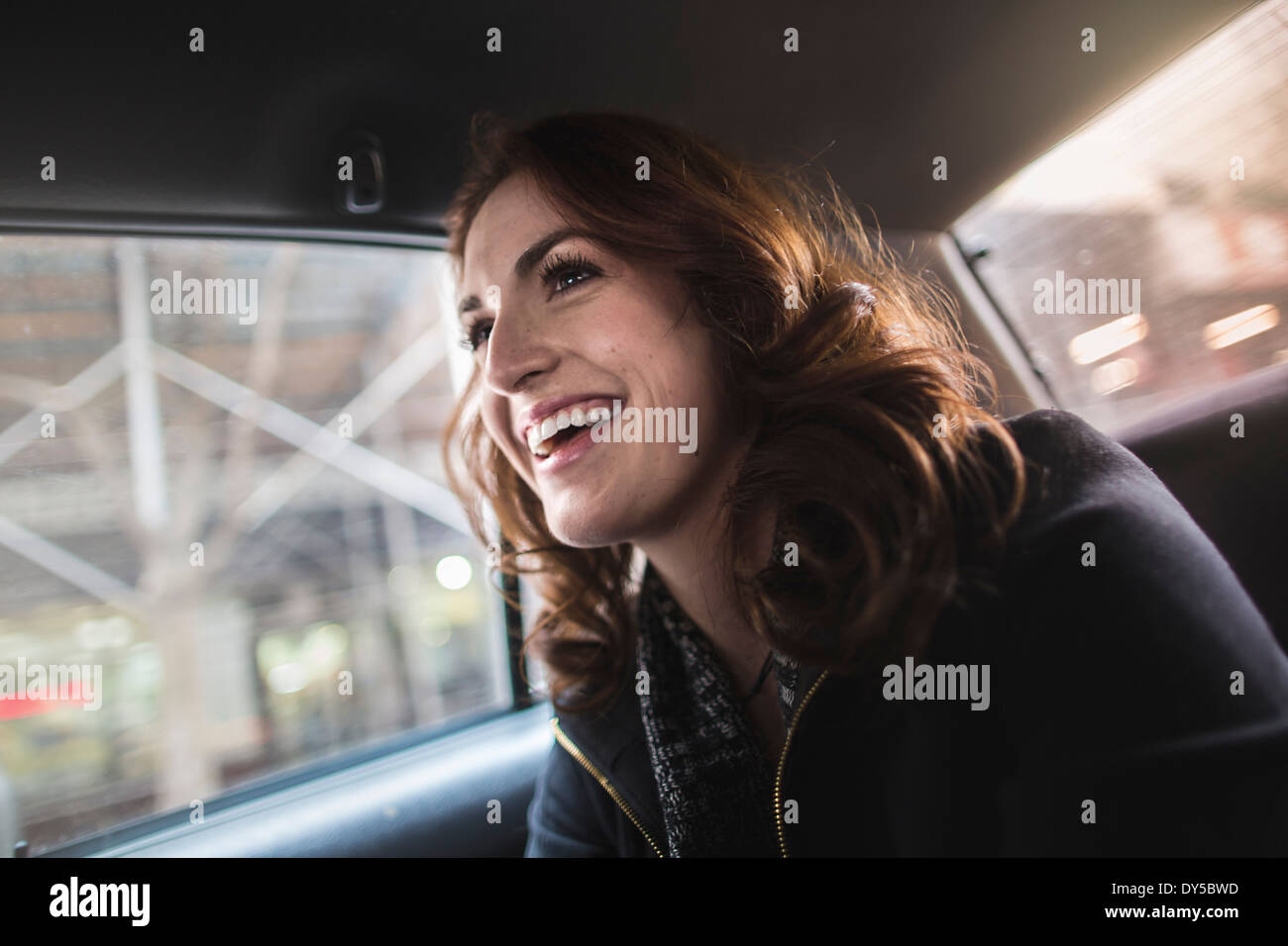 Person back of taxi hi-res stock photography and images - Alamy
