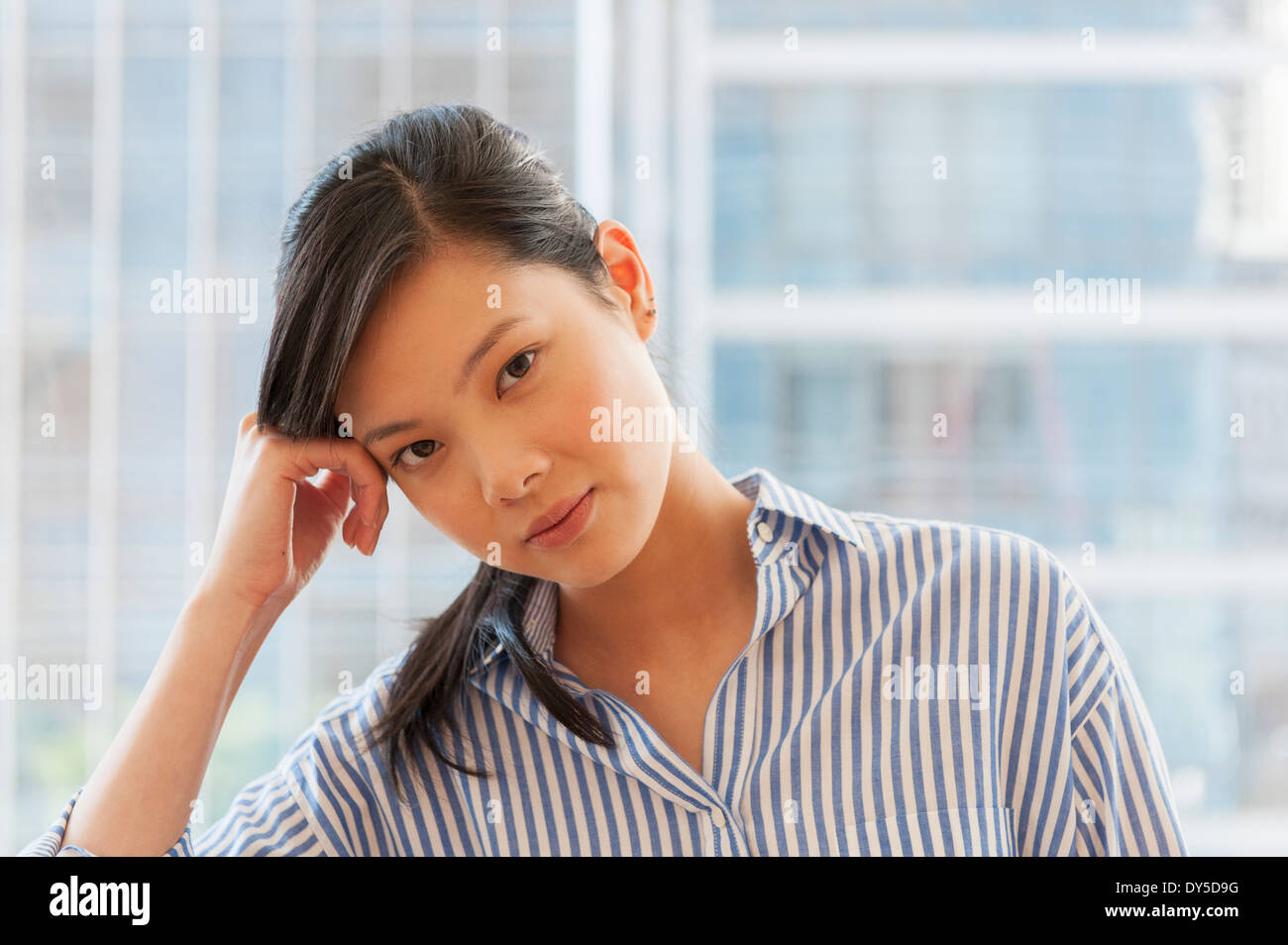 Portrait of bored female office worker Stock Photo - Alamy
