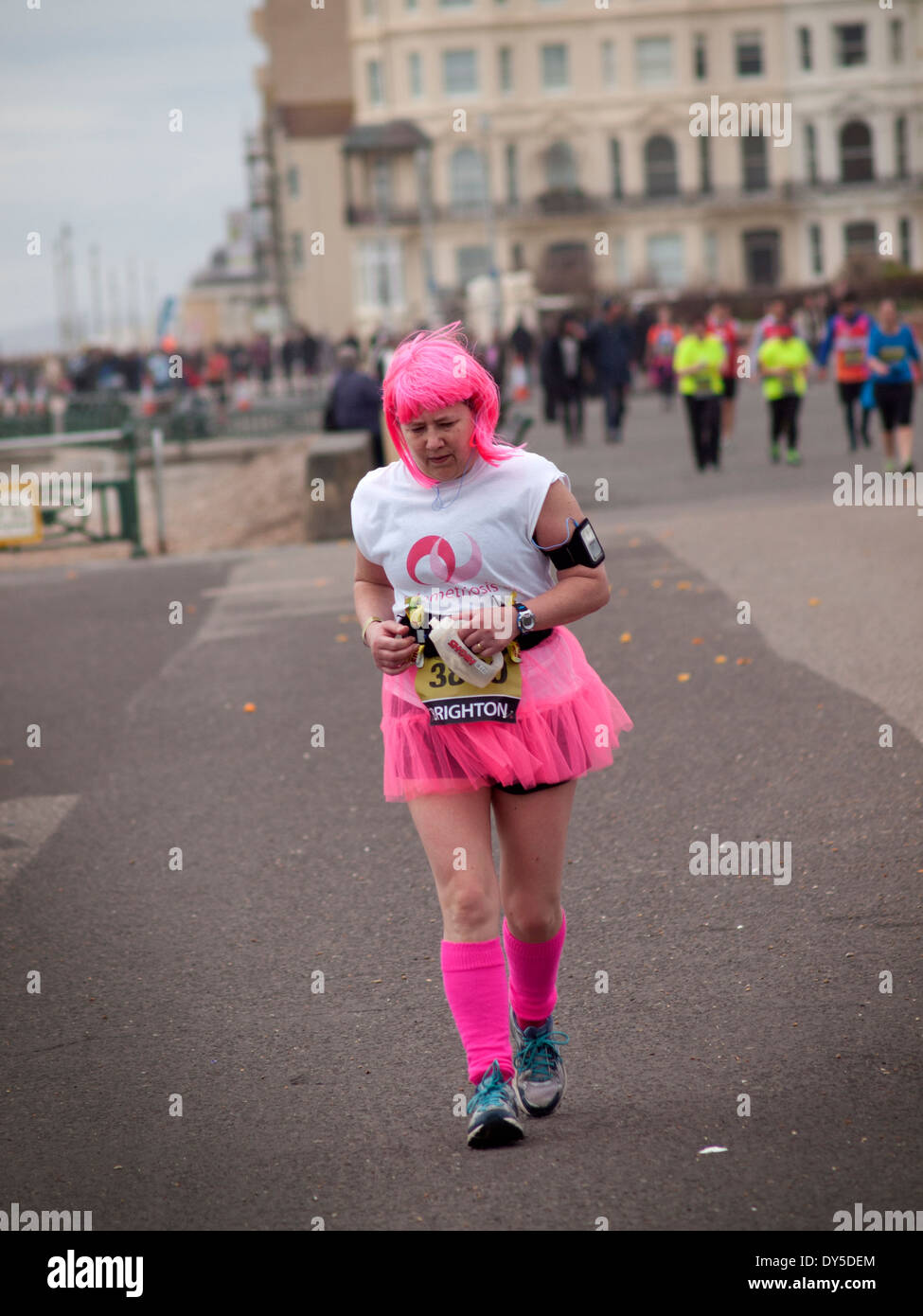 Amateur runners in the Brighton Marathon struggle towards the finishing ...