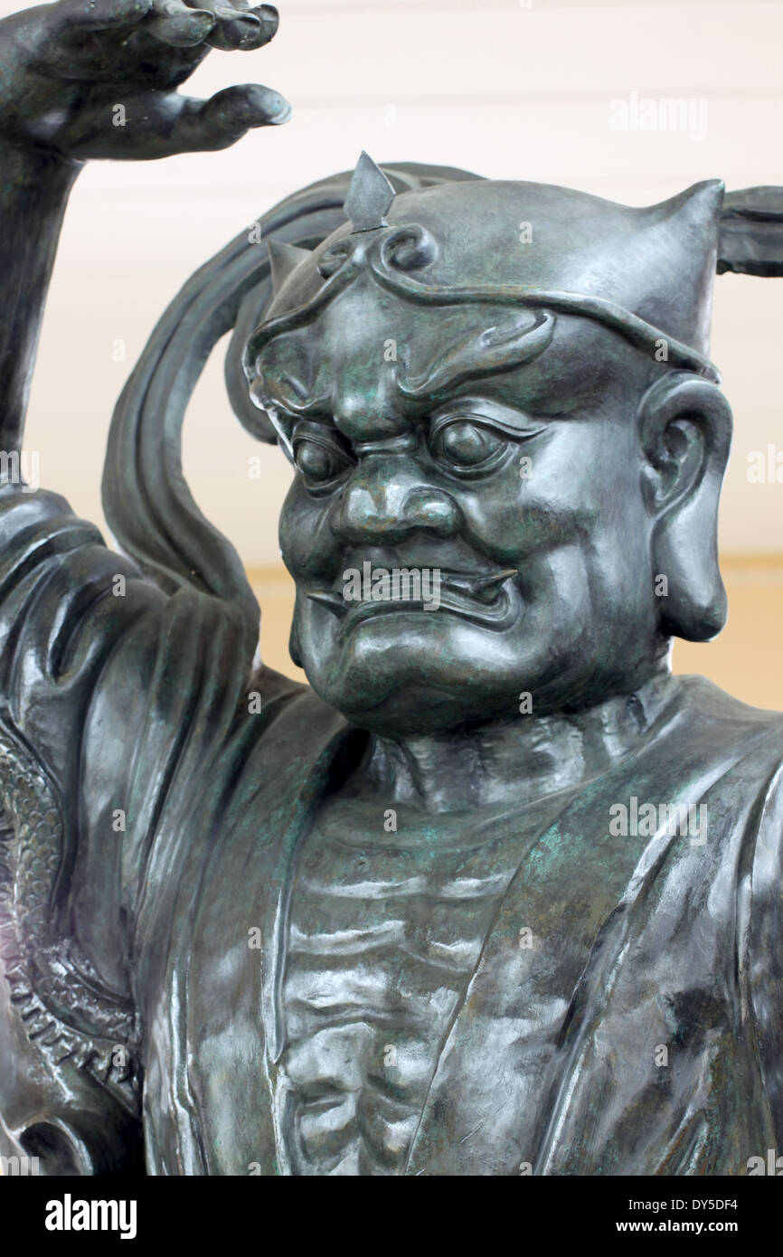 Black deity statues of Chinese religion in temple Stock Photo - Alamy