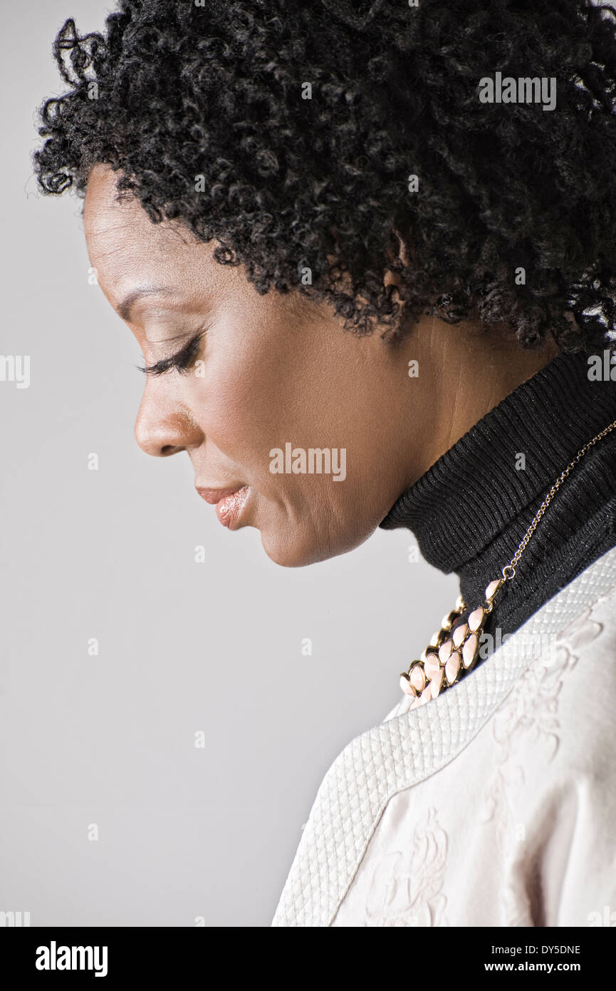 Portrait woman studio side profile hi-res stock photography and images ...