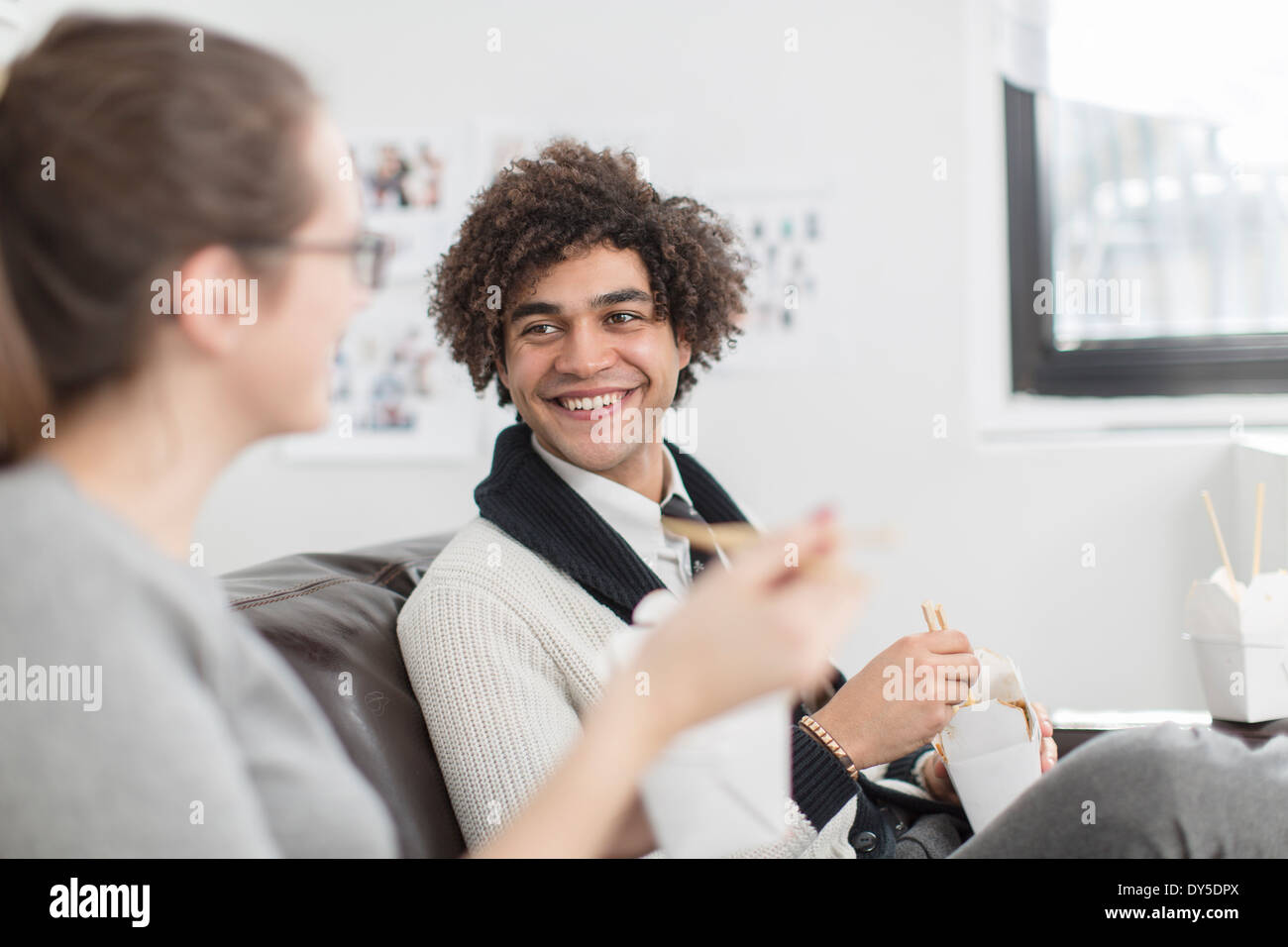 Two colleagues eating lunch Stock Photo - Alamy