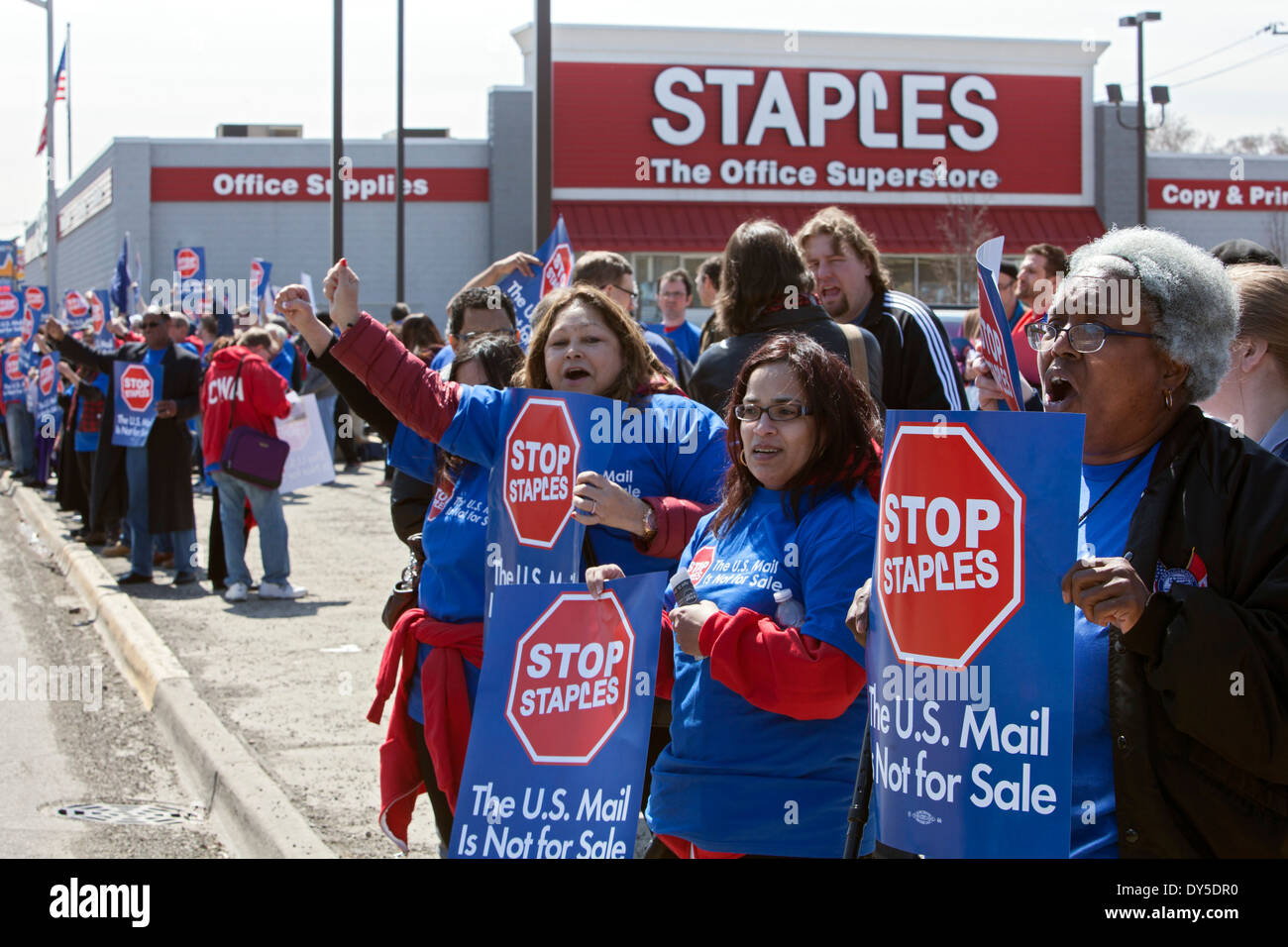 Union members picket Staples office supply store to protest plans to ...