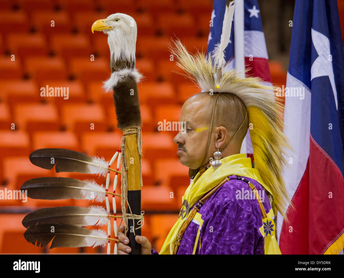 Man holding an eagle staff in the annual powwow held in Big Spring ...