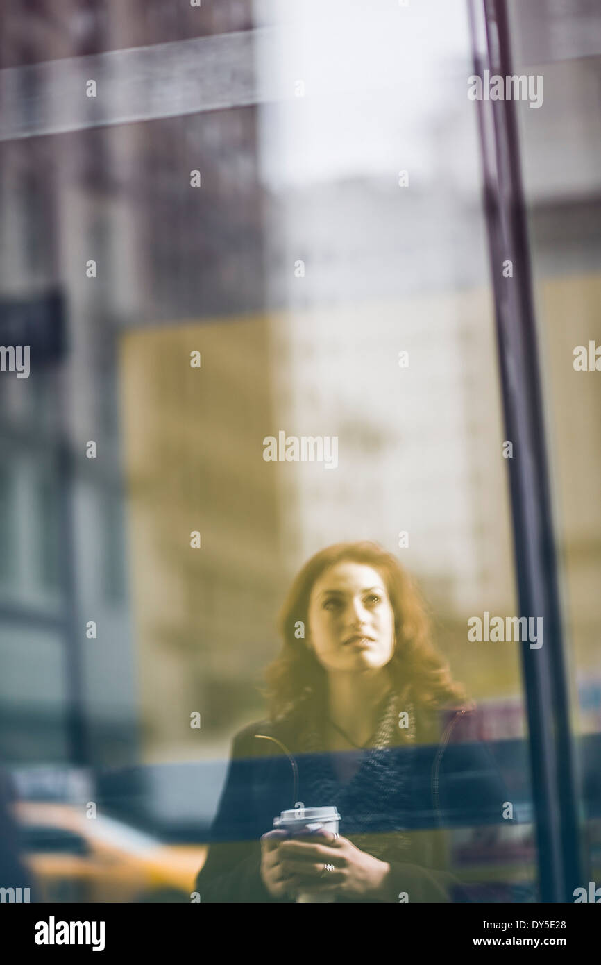 Woman reflected window hi-res stock photography and images - Alamy