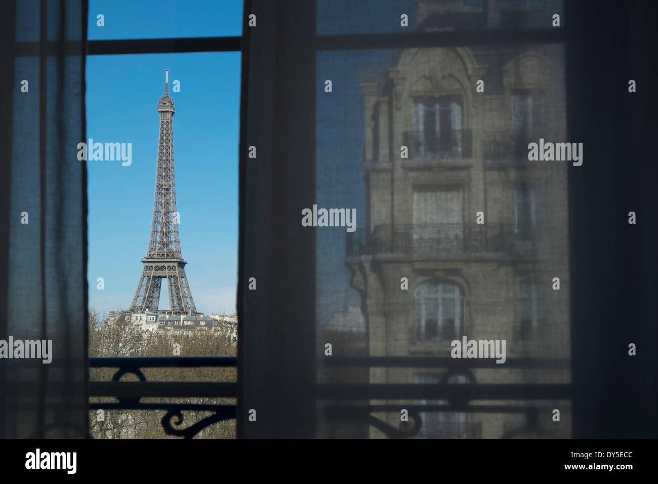 The Eiffel Tower, Paris, France, viewed through a window Stock Photo ...