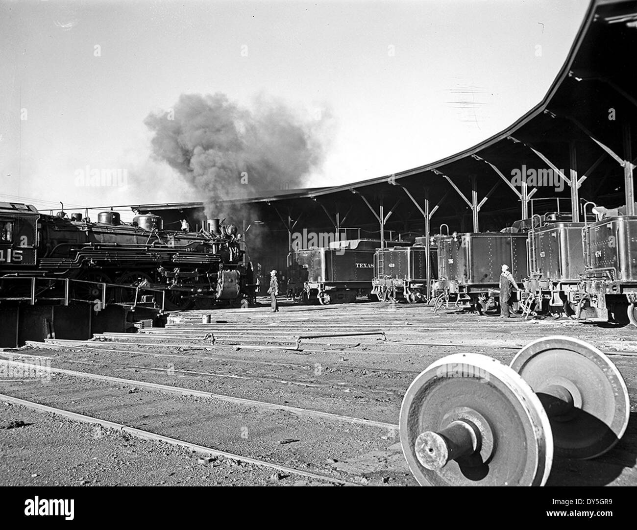 Locomotive 715 is shown on a turntable, a device used for rotating ...